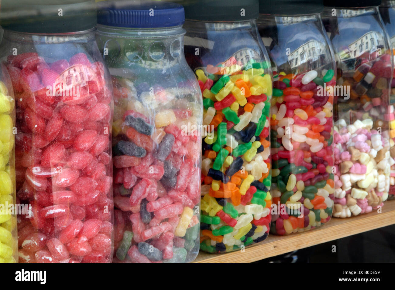 Colourful Sweet Jars Displayed in a Shop Window England UK Stock Photo ...