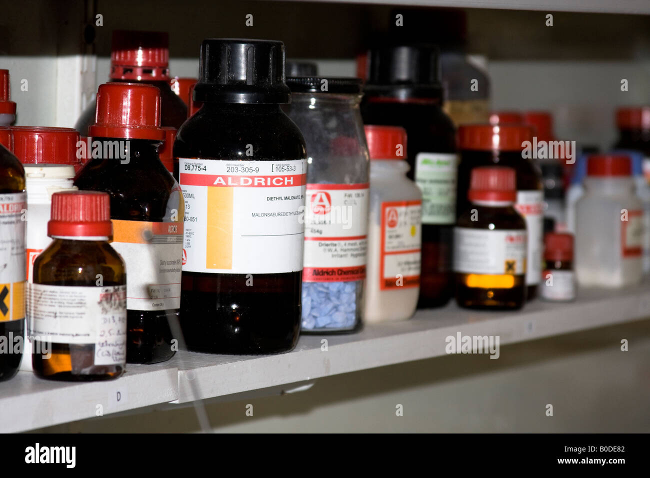 Chemicals in brown bottles in Chemistry lab Stock Photo - Alamy