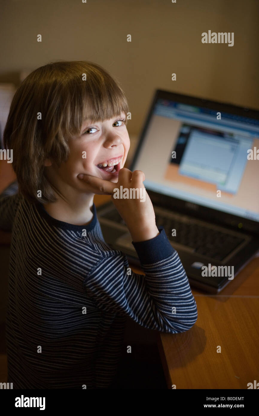 Year old boy uses computer hi-res stock photography and images - Alamy