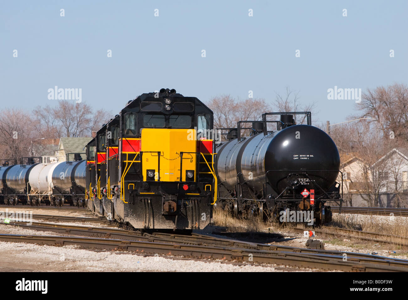 Several locomotives in a railway yard with tank cars Stock Photo - Alamy