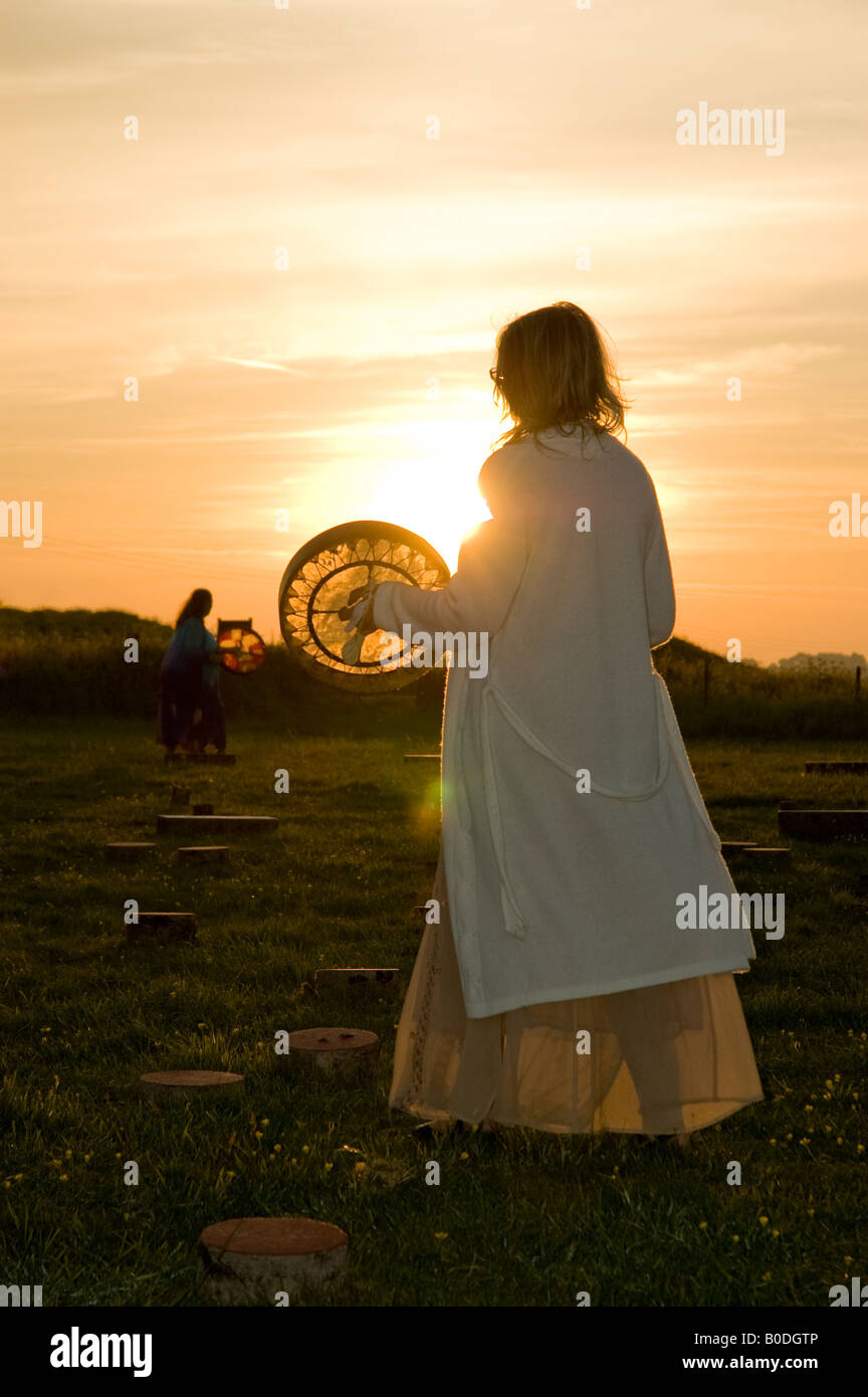 Drumming in the dawn, a Pagan ritual at sunrise during the transit of ...
