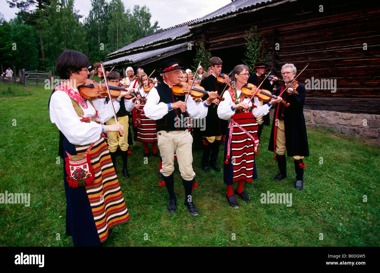 Folk musicians at Midsummer in Dalarna county Stock Photo - Alamy