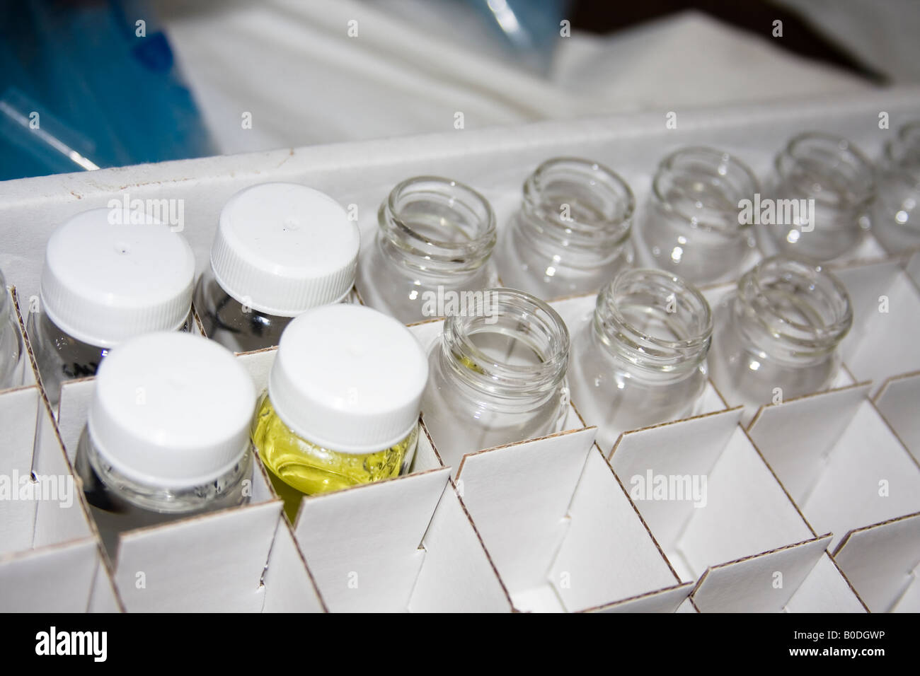 Glass bottles for science experiments in laboratory Stock Photo - Alamy