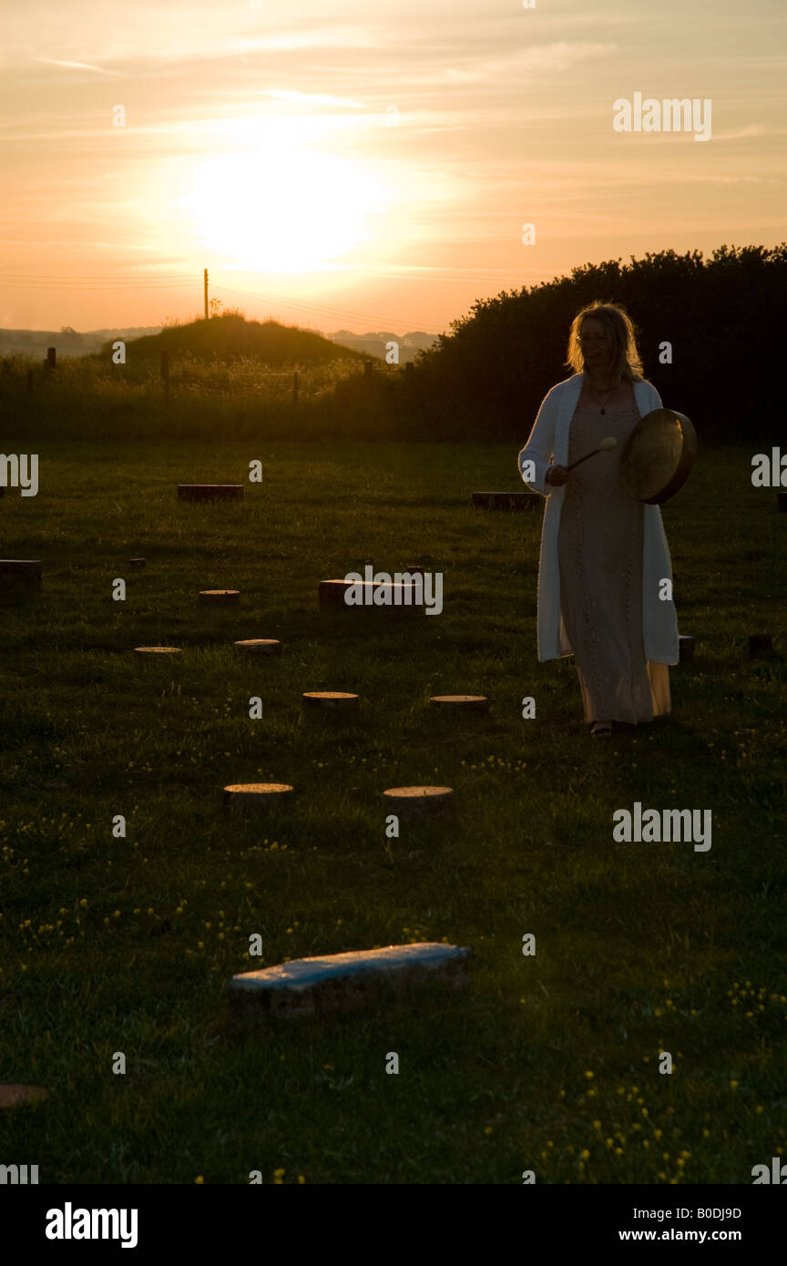 Drumming in the dawn, a Pagan ritual at sunrise during the transit of ...