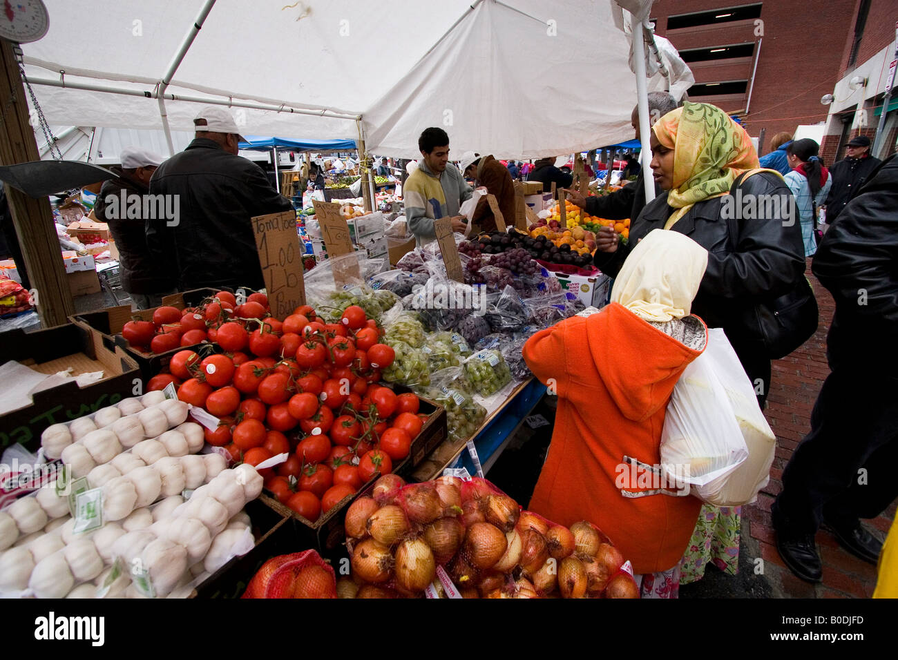 Shoppers crowd the Haymarket in downtown Boston on Saturday, May 3 ...