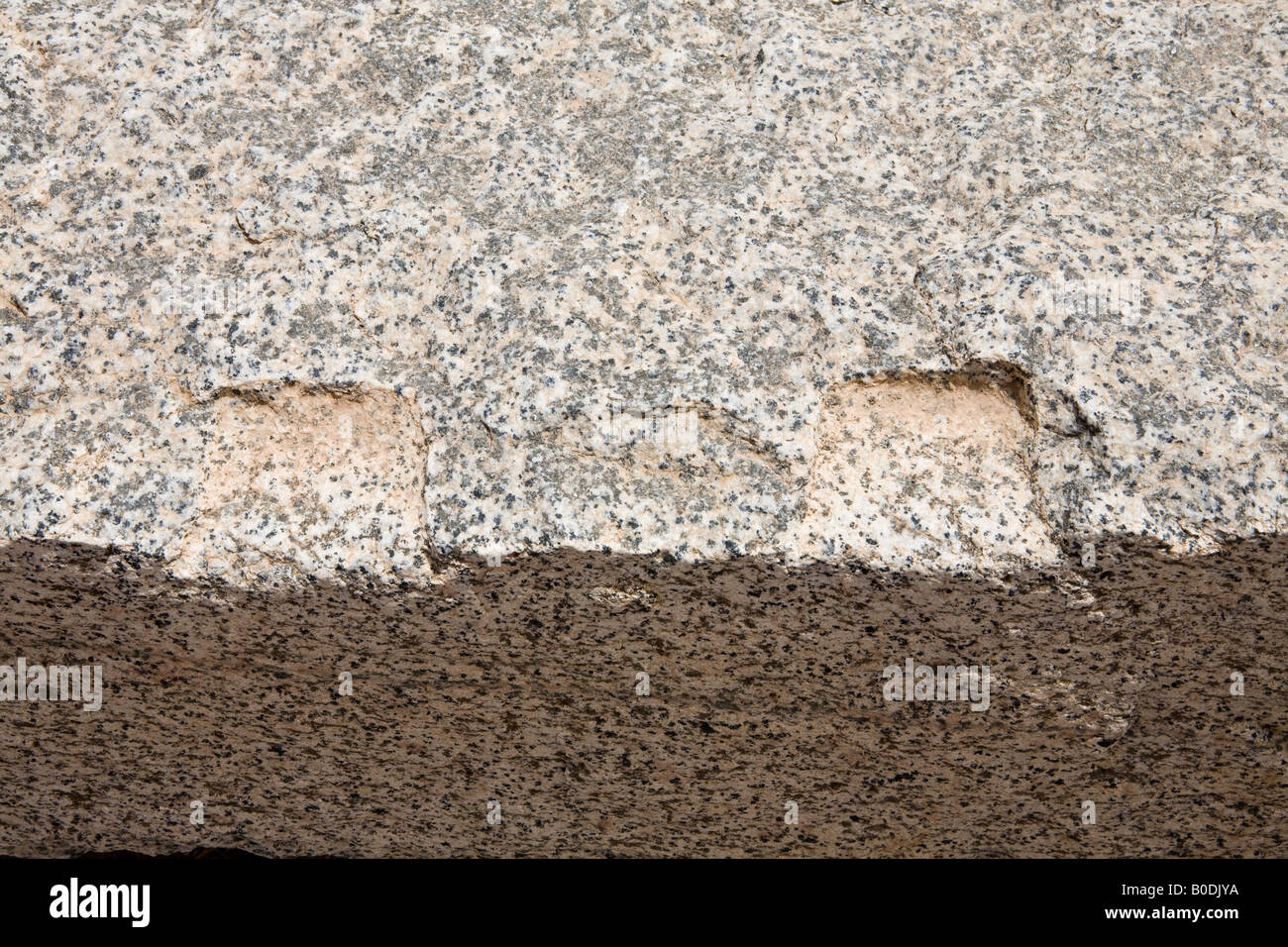 Granite block showing quarry markings in the Roman town and fort at ...