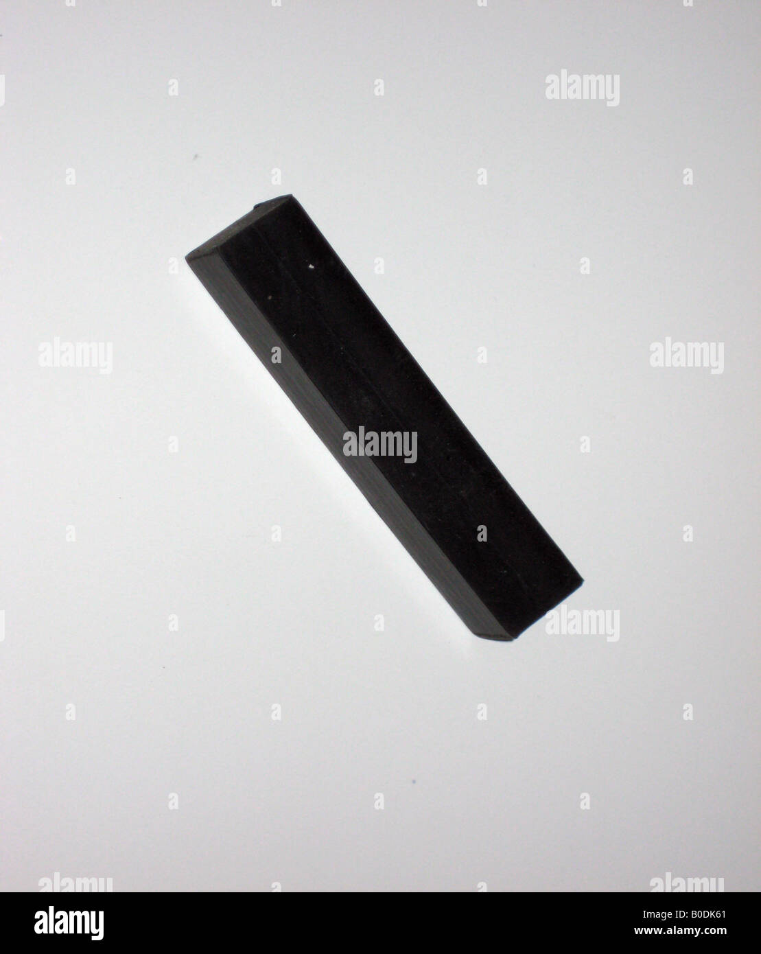 Photo of black EPDM setting block used for construction Stock Photo - Alamy