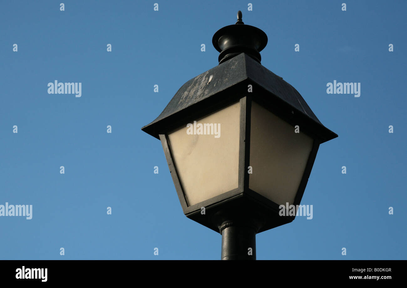 Lamp post against a blue sky Stock Photo - Alamy