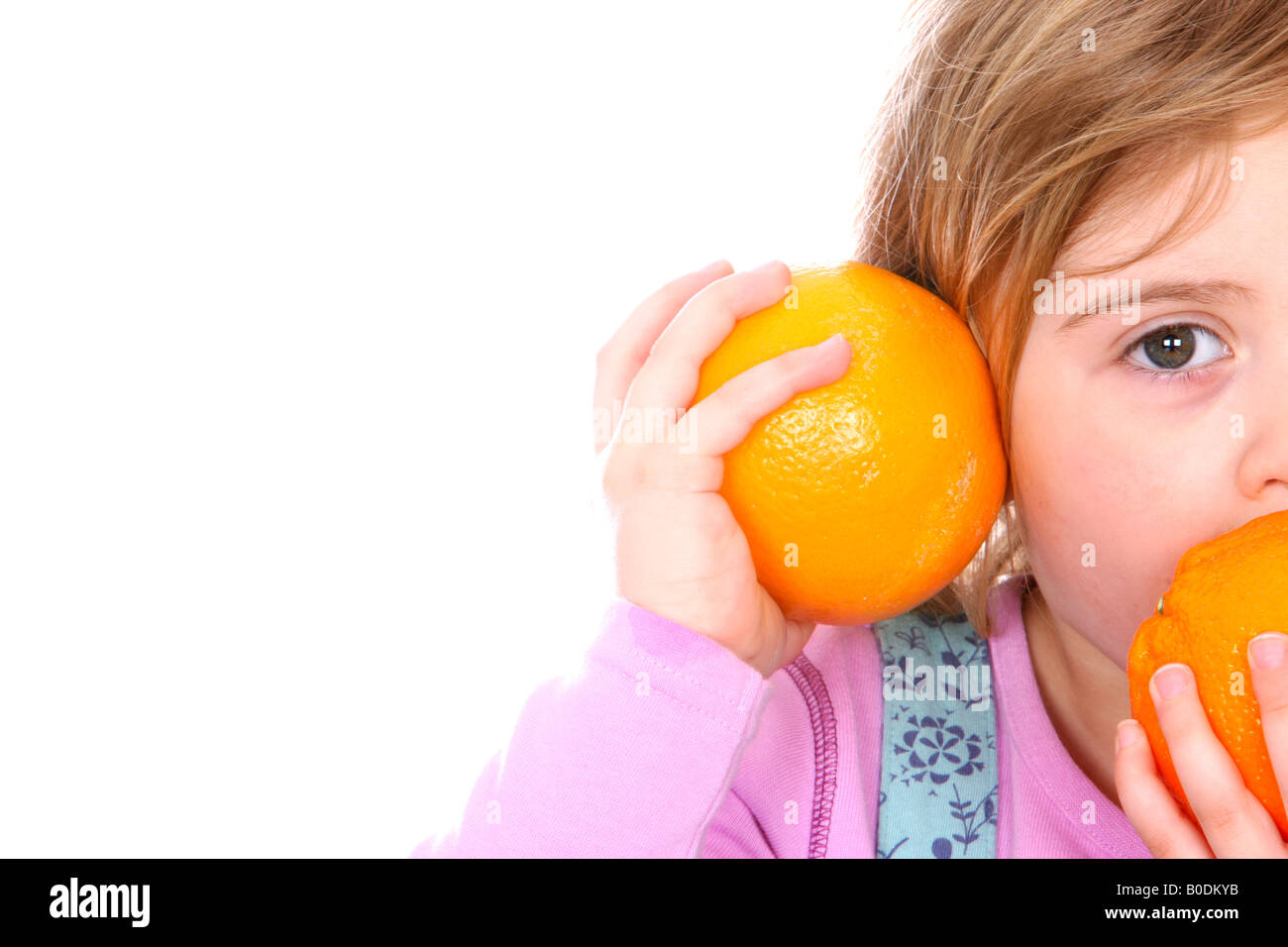 Young Girl Eating Oranges Model Released Stock Photo - Alamy