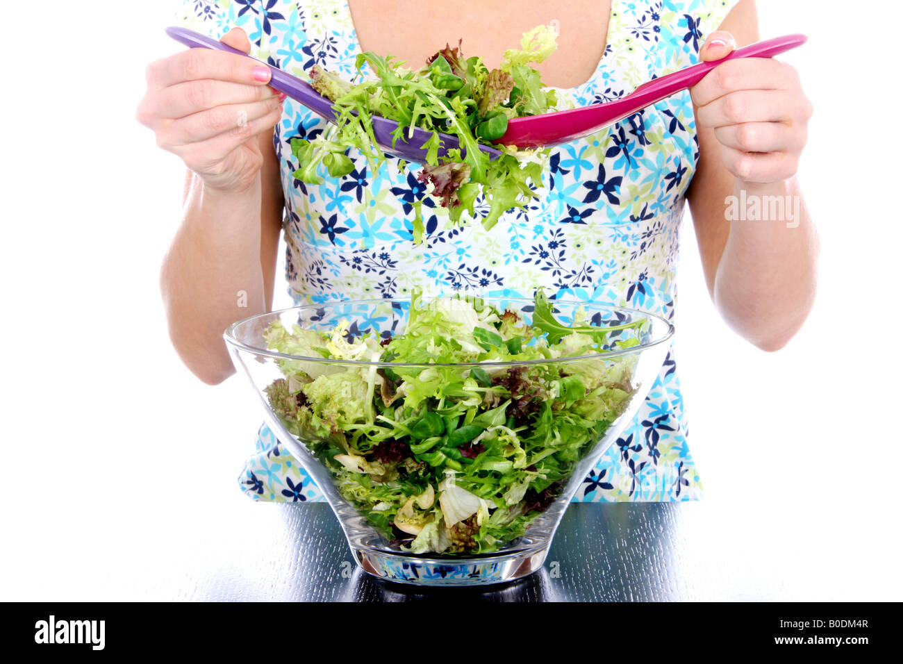 Young Woman Making Tossing Fresh Healthy Green Salad In A Large Mixing ...