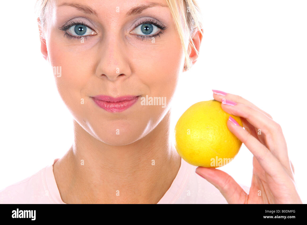 Young Woman Holding Lemon Model Released Stock Photo - Alamy