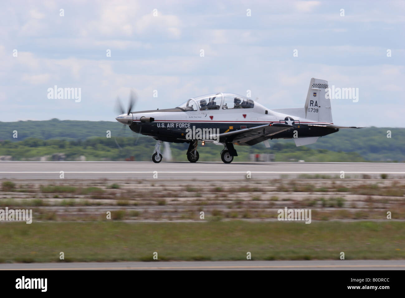 T 6A slows after landing at Quonset State Airport in North Kingstown ...