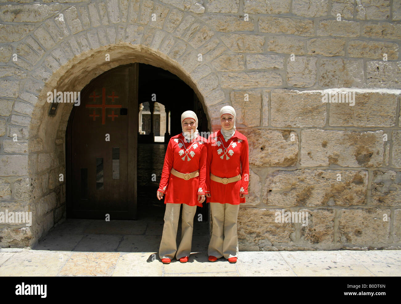two yound arab girls standing infront of nativity church bethlehem ...