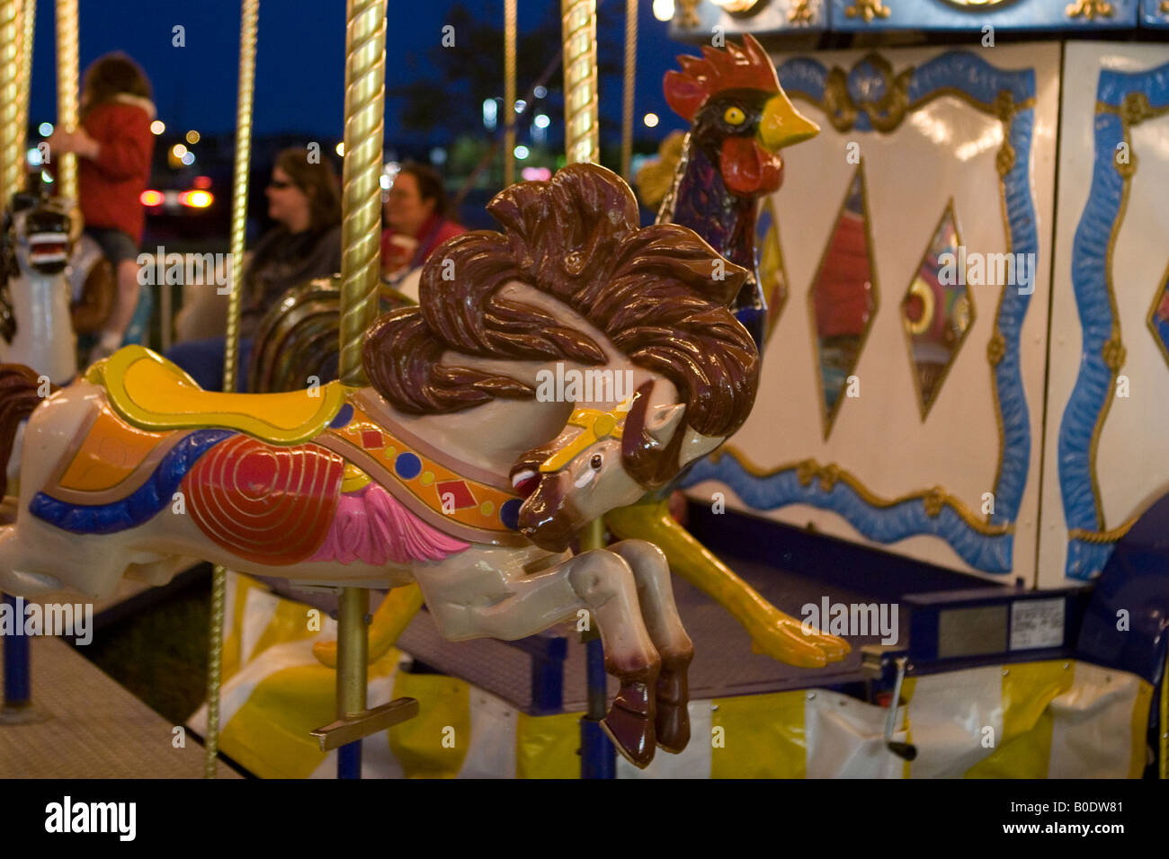 Spinning Merry-Go-Round Amusement Ride at Night Stock Photo - Alamy