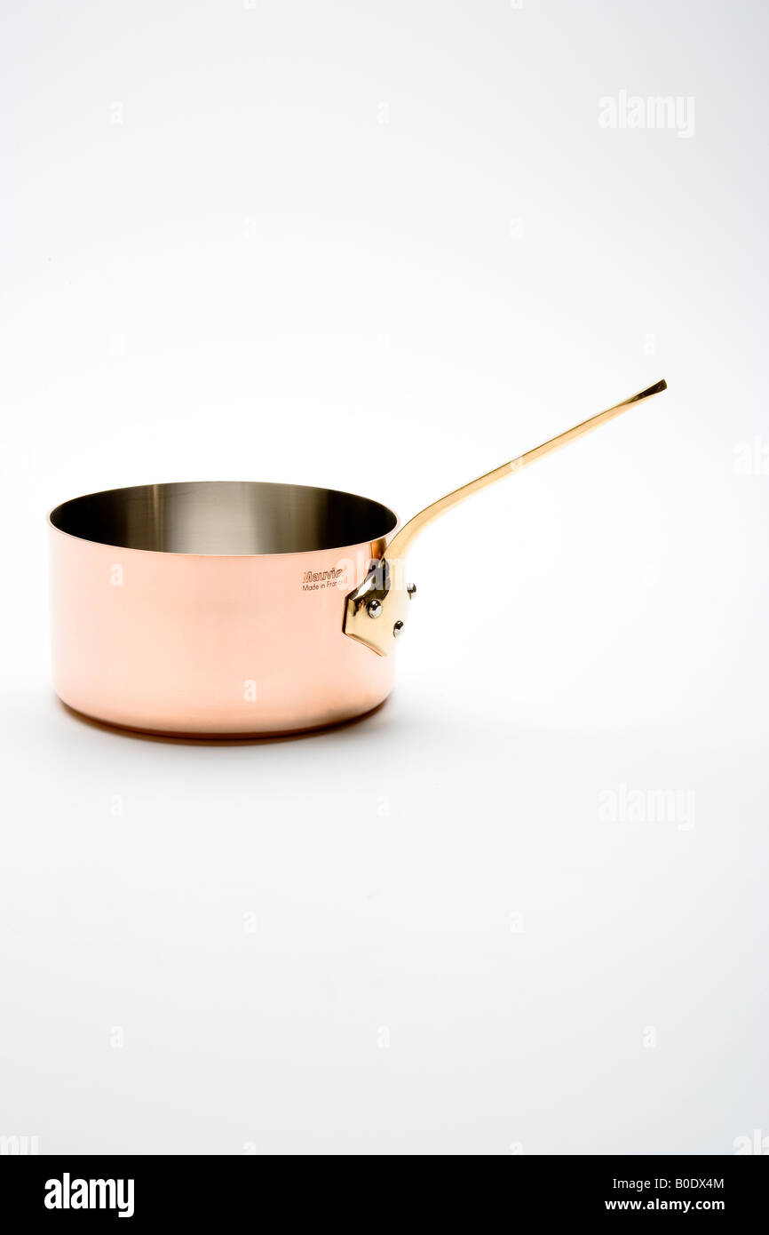 A copper pot on a white background Stock Photo - Alamy