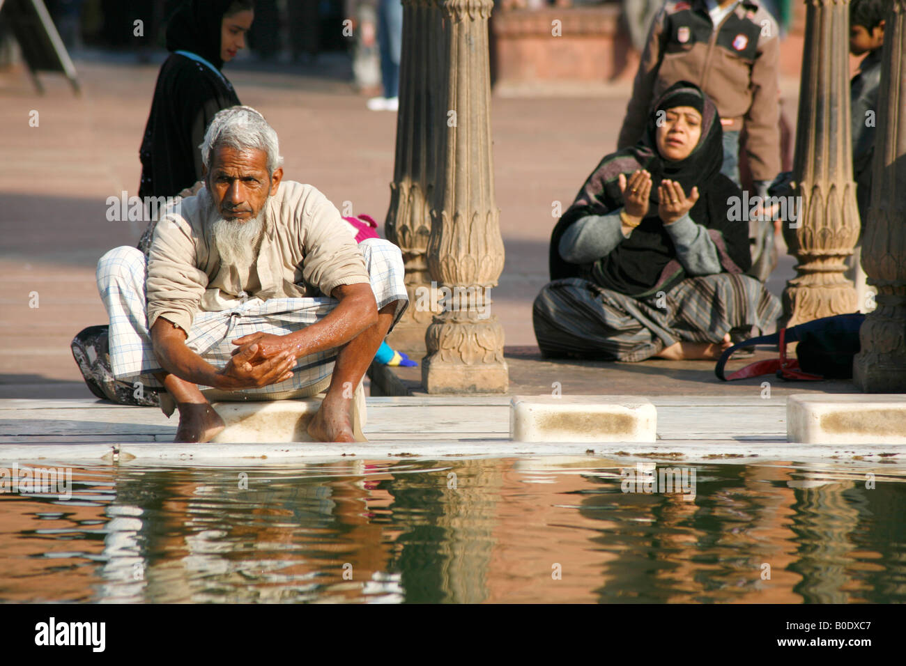 Old man performing ablution at Jama Masjid Delhi India Stock Photo - Alamy