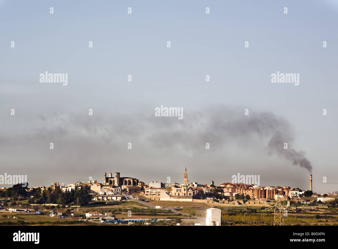 smoke cloud over town. l'arboç Stock Photo - Alamy