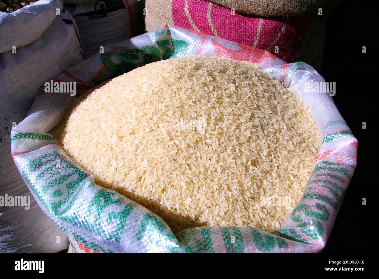 white rice in sack at market Stock Photo - Alamy