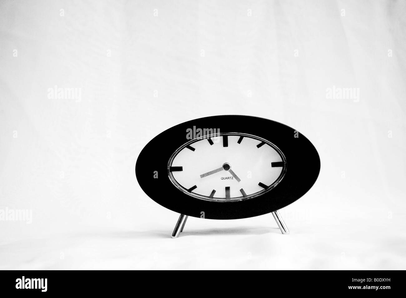 This clock shows the time of 4:45 pm Stock Photo - Alamy