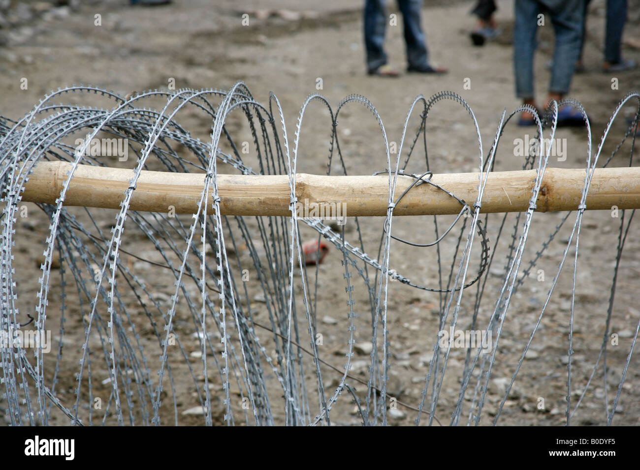 barbed wire barrier Stock Photo - Alamy