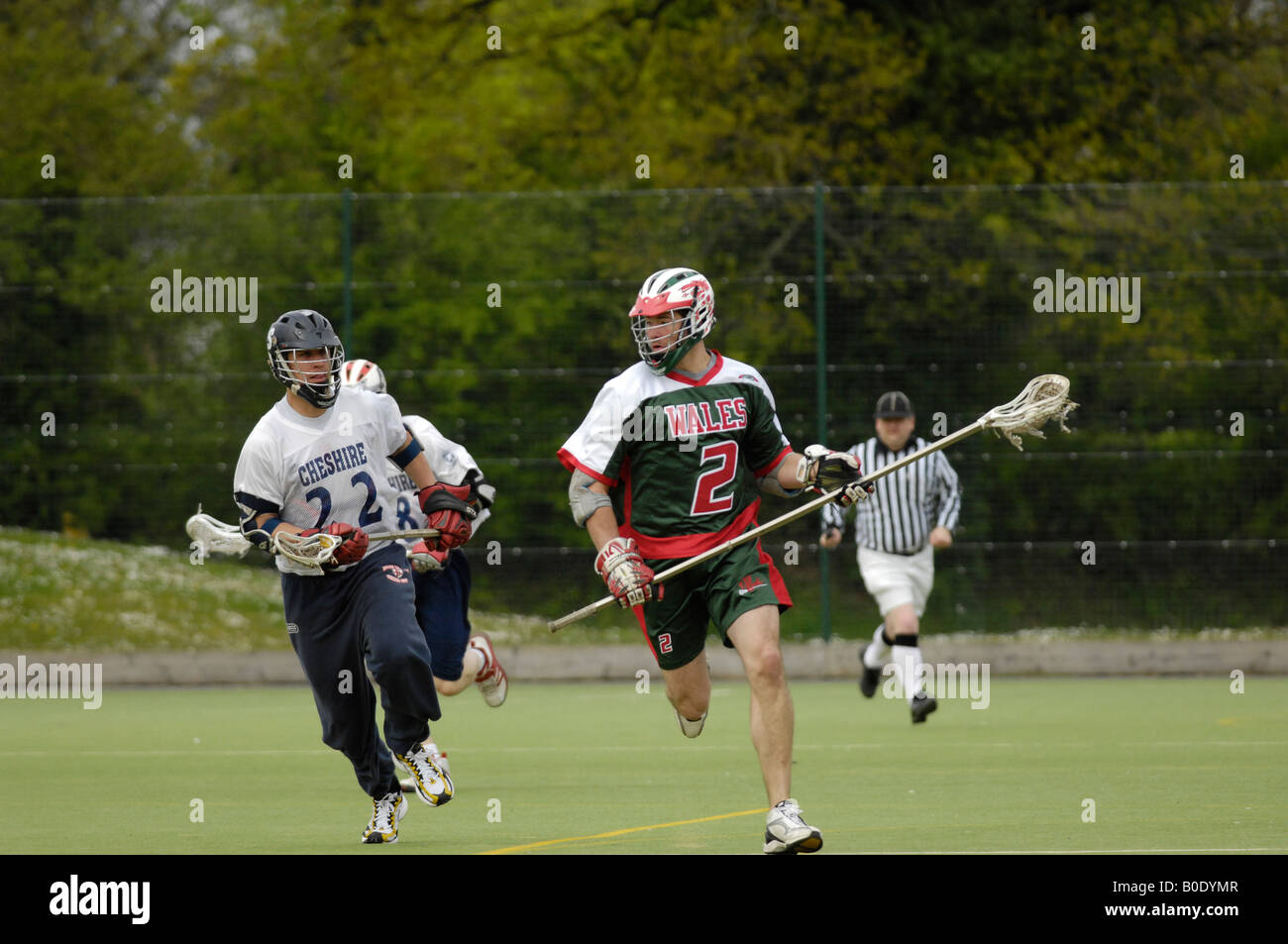 lacrosse players in action Stock Photo - Alamy