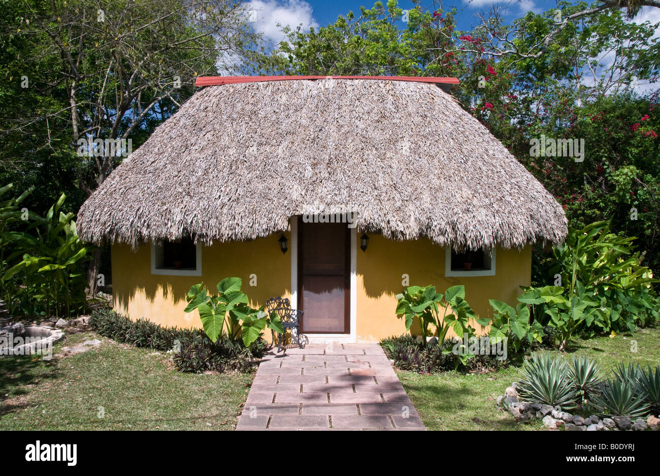 Yellow cottage chichen itza hi-res stock photography and images - Alamy