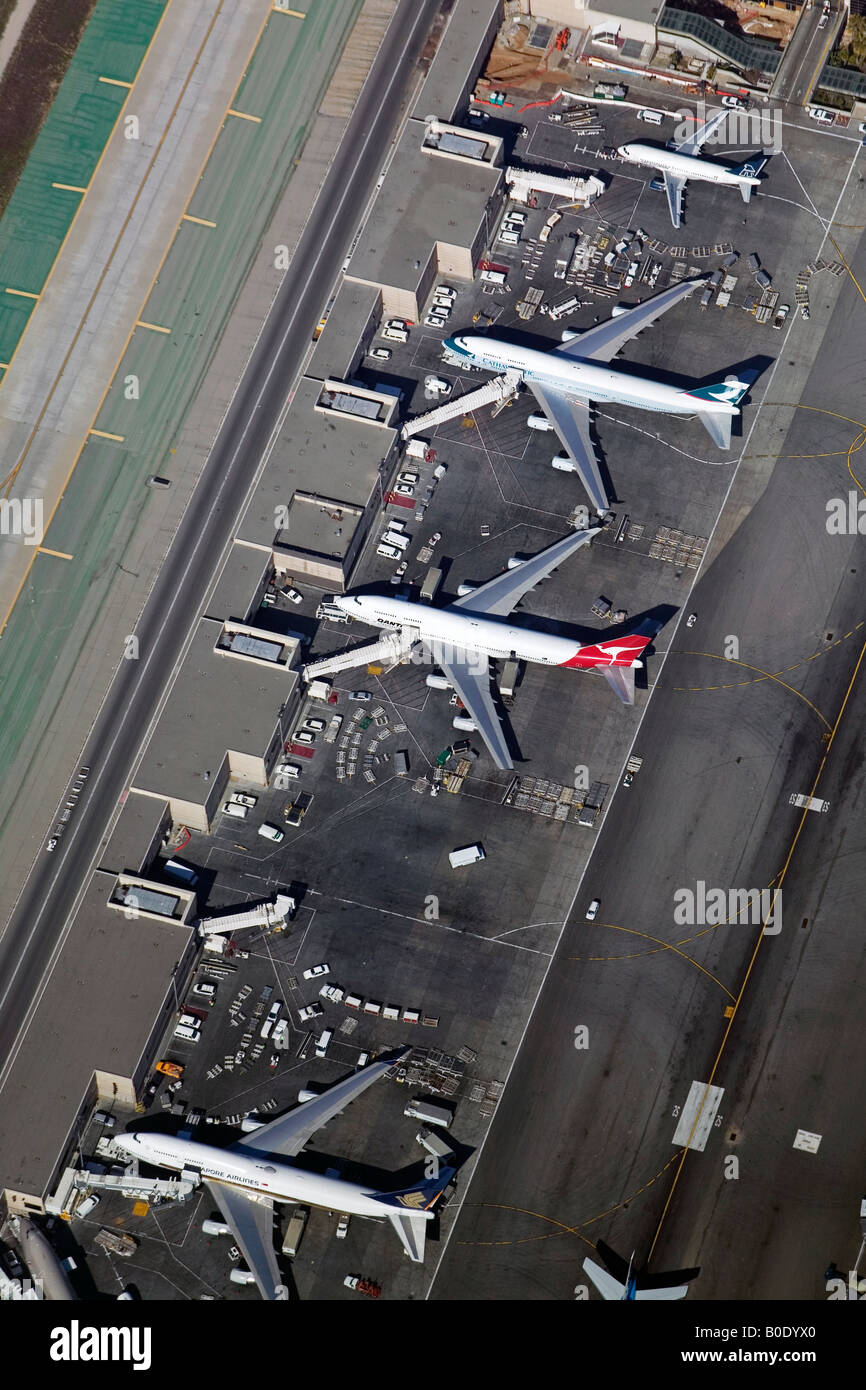aerial above loading and unloading airliners at Los Angeles ...