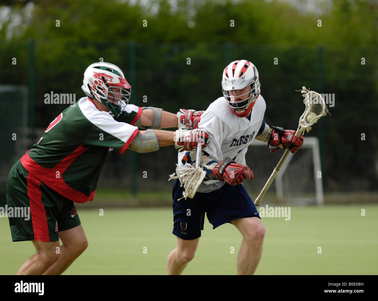 lacrosse players in action Stock Photo - Alamy