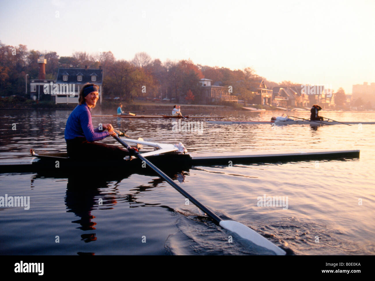Woman enjoying river scene sunset hi-res stock photography and images ...