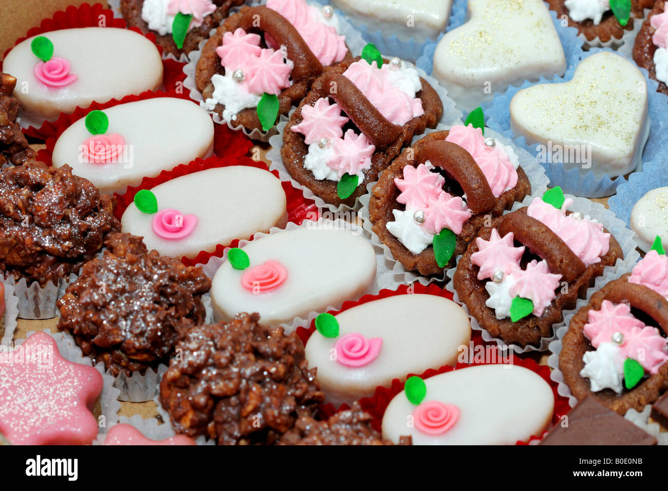 many different colorful chocolate cookies Stock Photo - Alamy