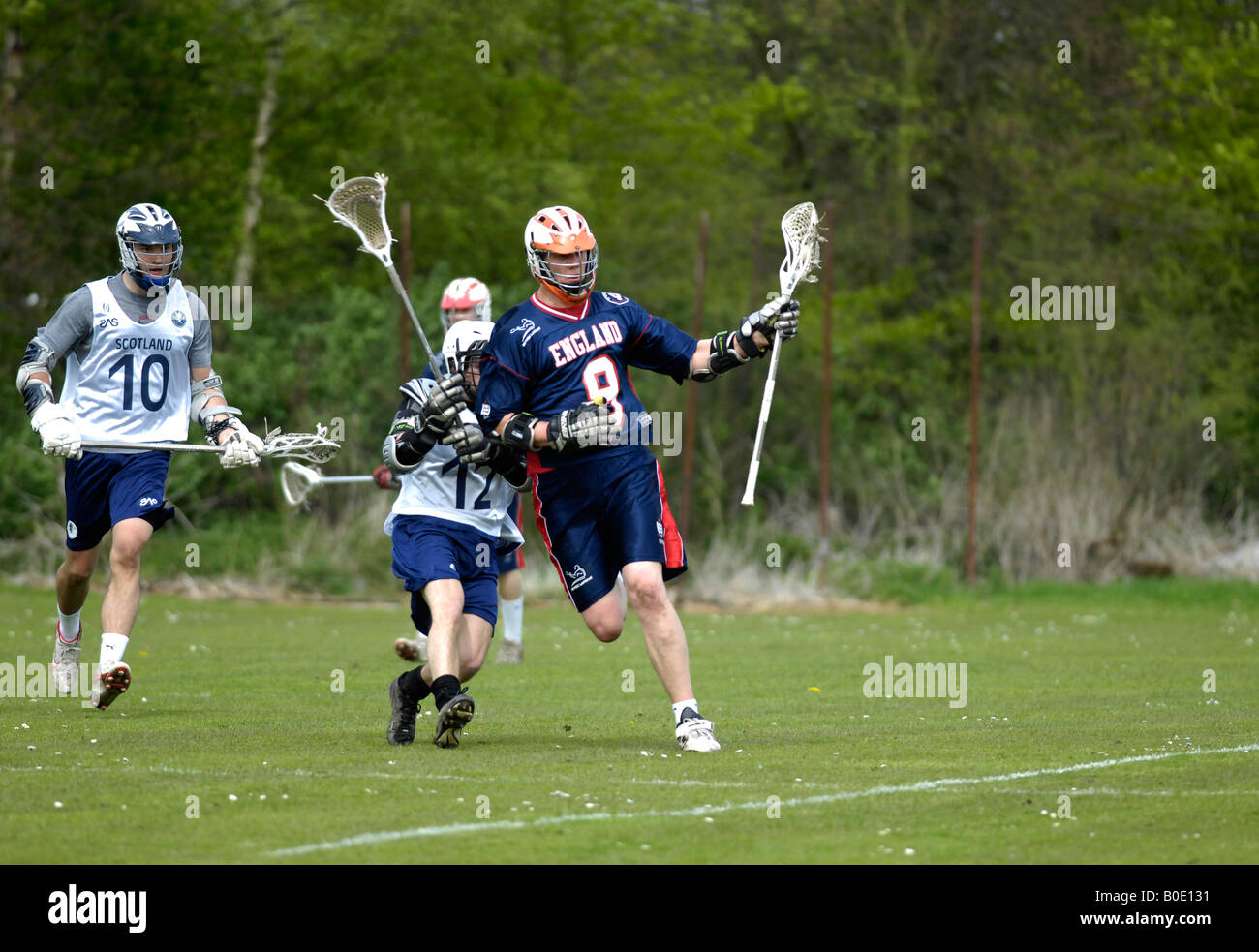 lacrosse players in action Stock Photo - Alamy