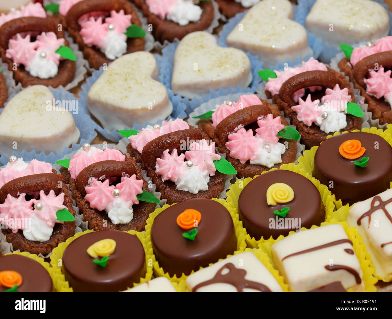 many different colorful chocolate cookies Stock Photo - Alamy
