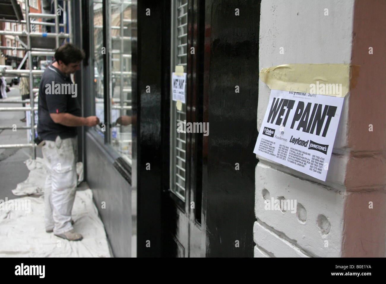 shop being painted Stock Photo - Alamy