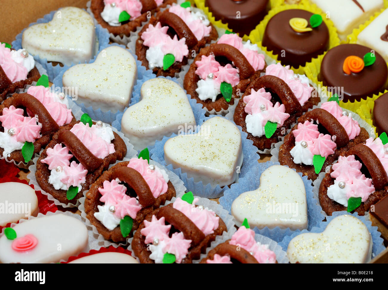 many different colorful chocolate cookies Stock Photo - Alamy