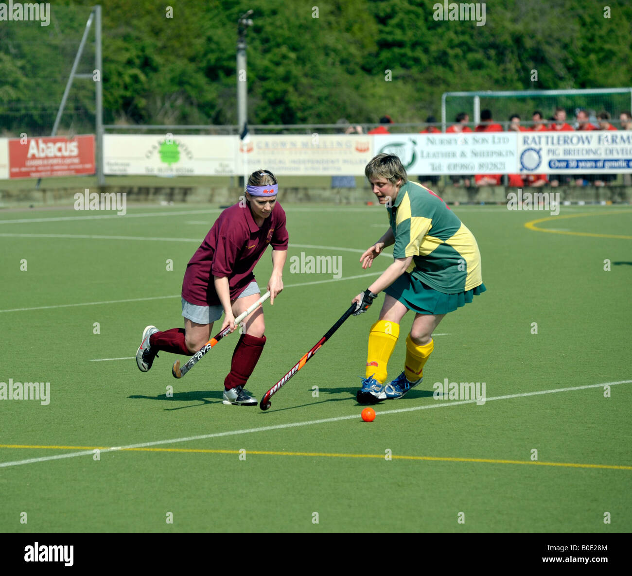 women playing field hockey outside on astroturf synthetic medium Stock ...