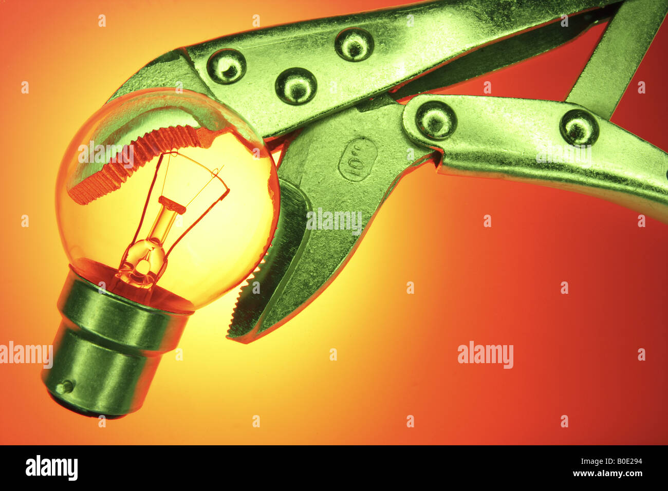 Wrench with Light Bulb Stock Photo - Alamy