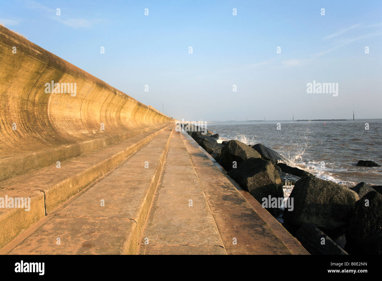 Sea wall and rock breakwater at Sea Palling, Norfolk, UK, to protect ...