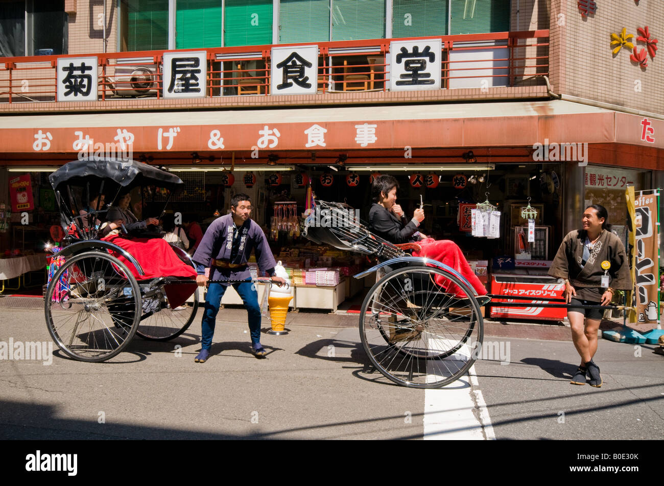 Rickshaw pullers with tourists in Asakusa, Tokyo, Japan Stock Photo - Alamy