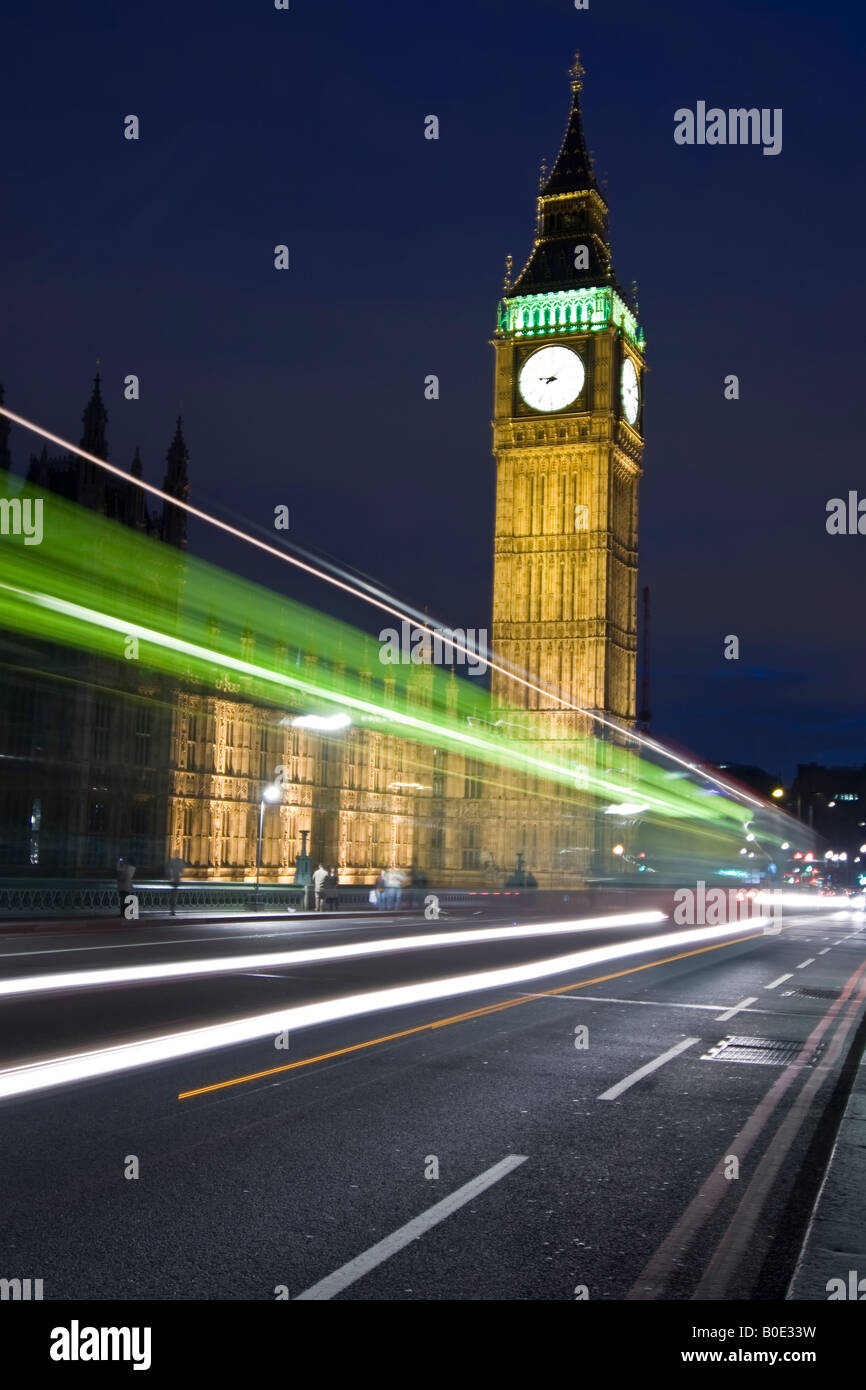 Nocturne scene with Big Ben behind light beams Stock Photo - Alamy