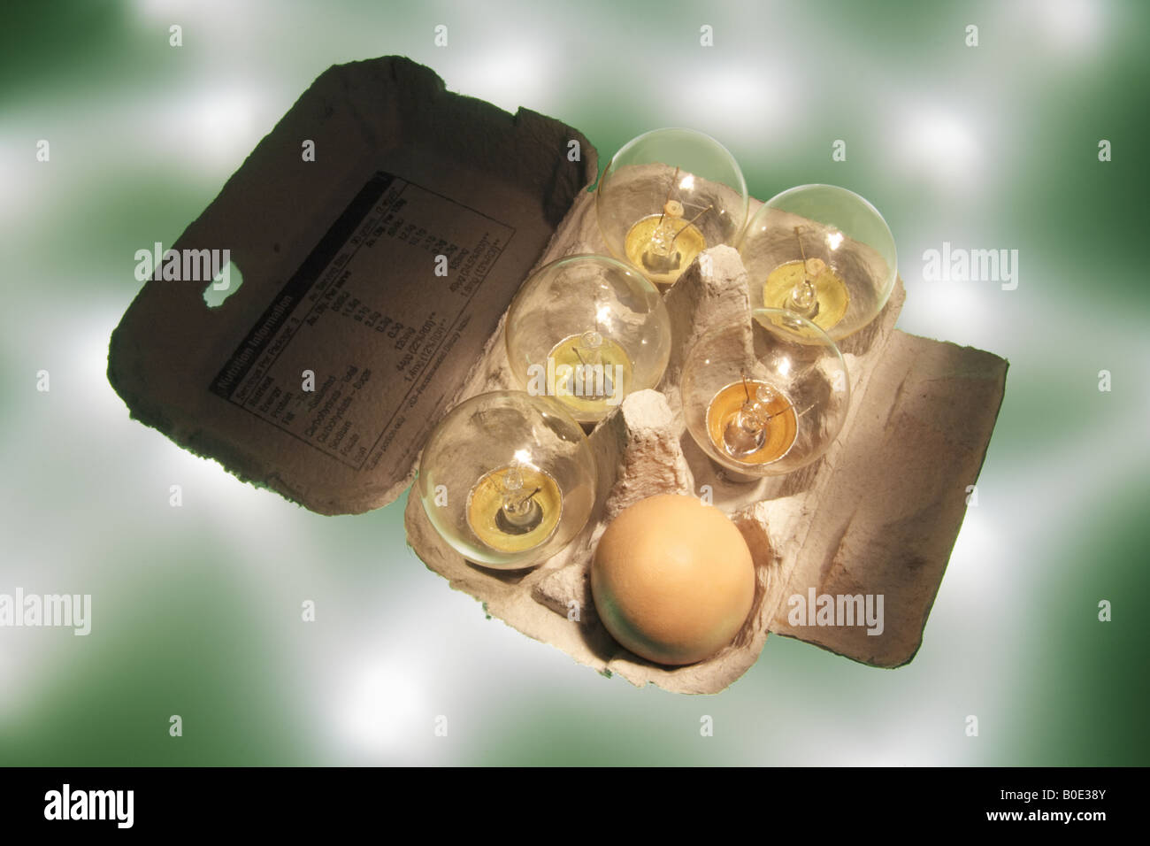 Egg and Light Bulbs in Egg Carton Stock Photo - Alamy