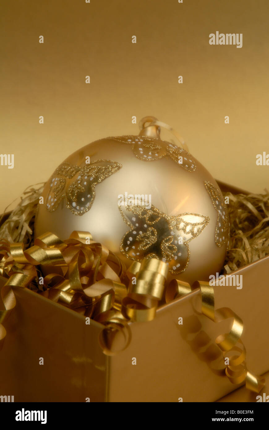 Golden christmas bauble Stock Photo - Alamy