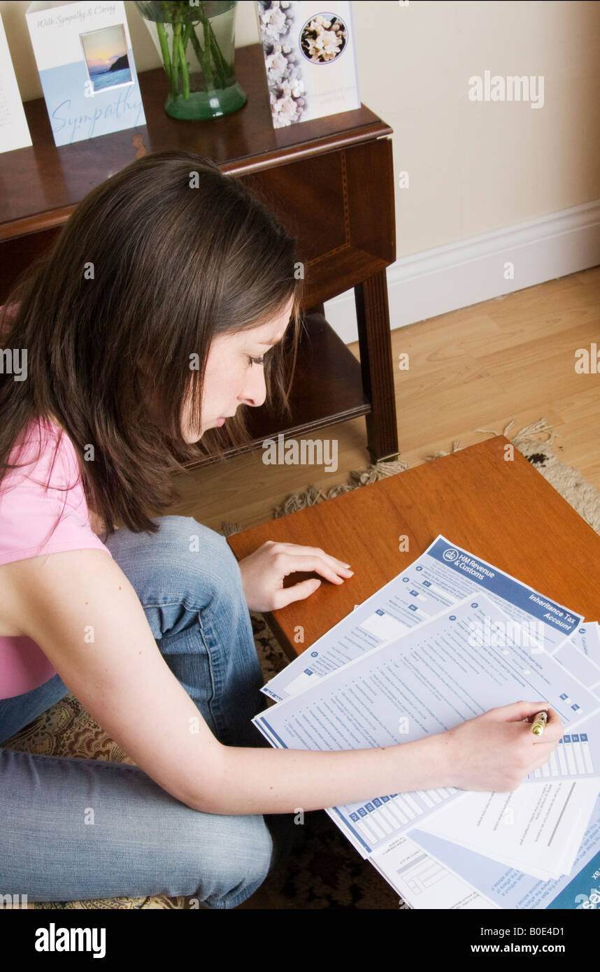 Completing forms hi-res stock photography and images - Alamy