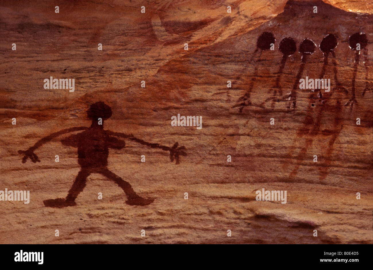 Aboriginal Rock Art - Woman sorcery fig and yams - Australia Stock ...