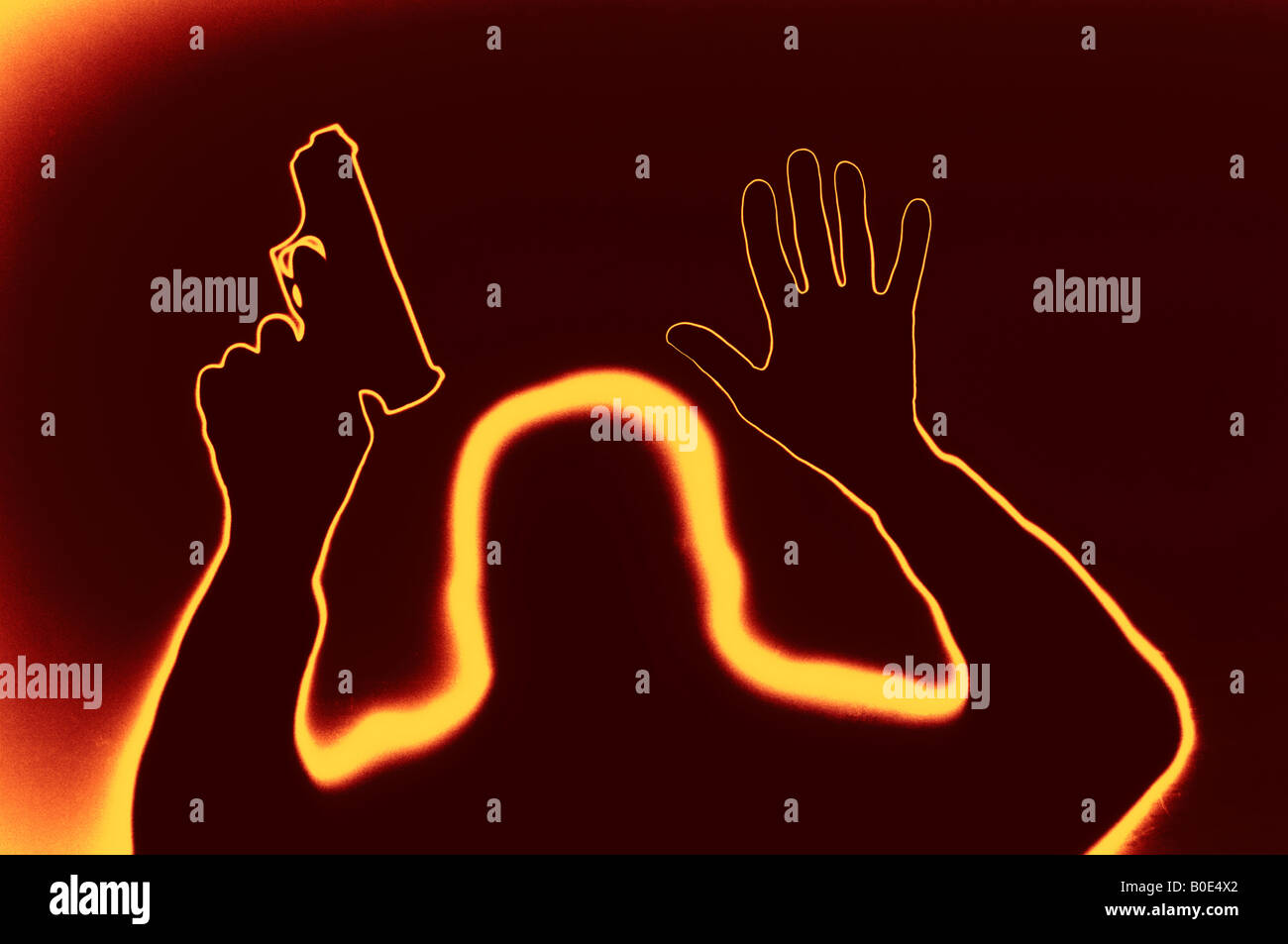 abstract view of hooded man with hand gun Stock Photo - Alamy