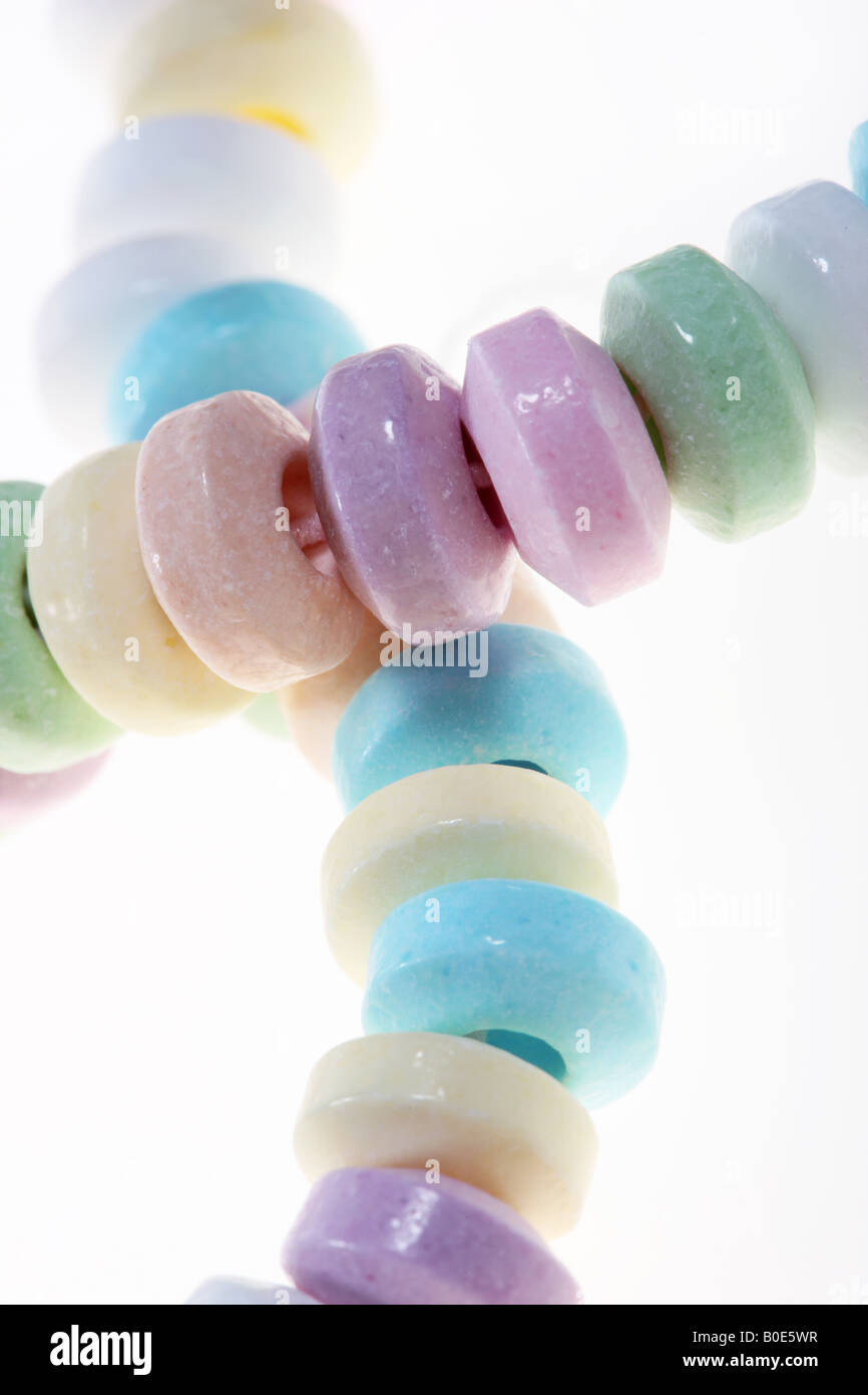 Sweets Chain of colored candys Stock Photo - Alamy