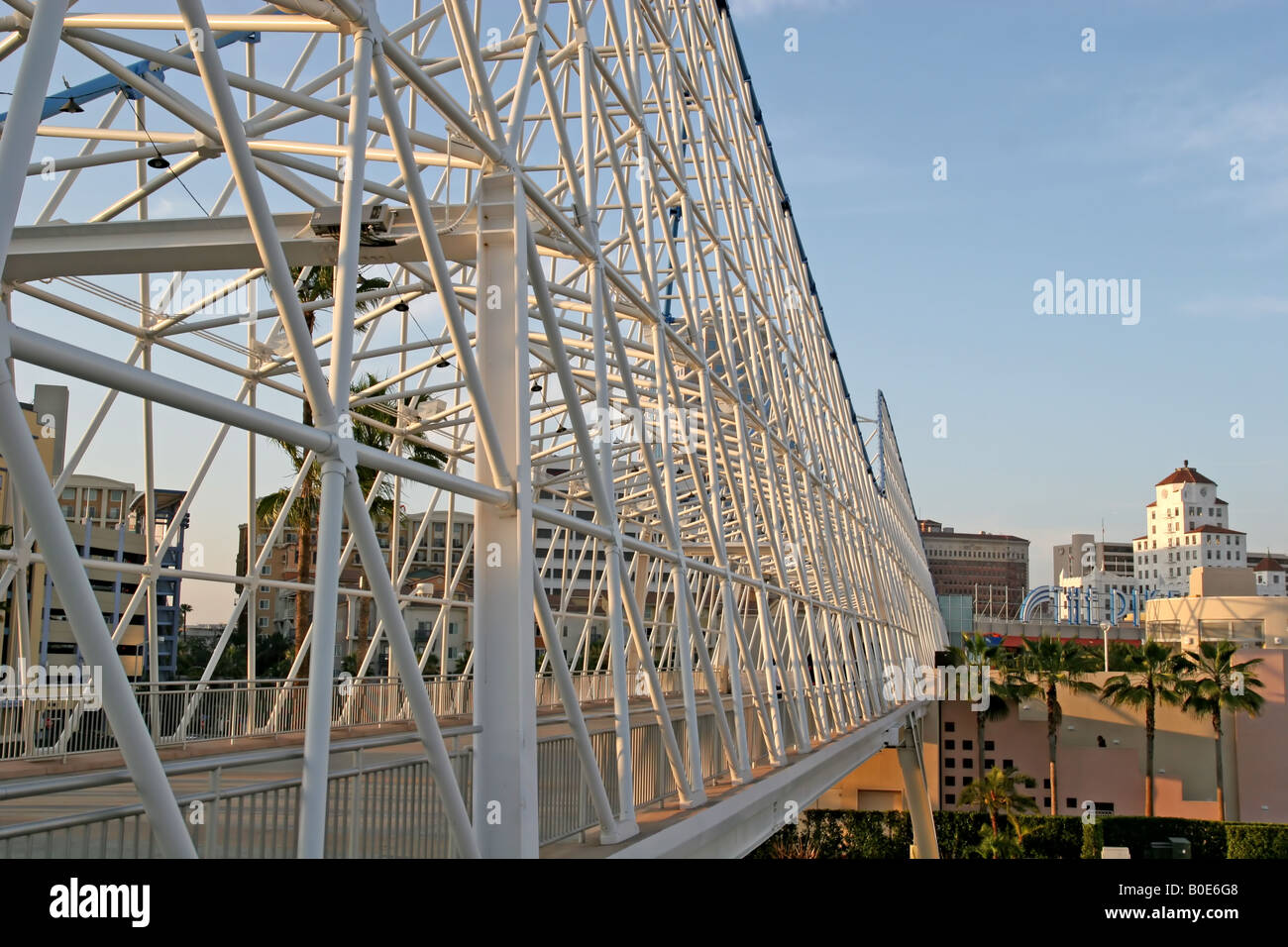 A white steel bridge spanning a pedestrian walkway Stock Photo - Alamy