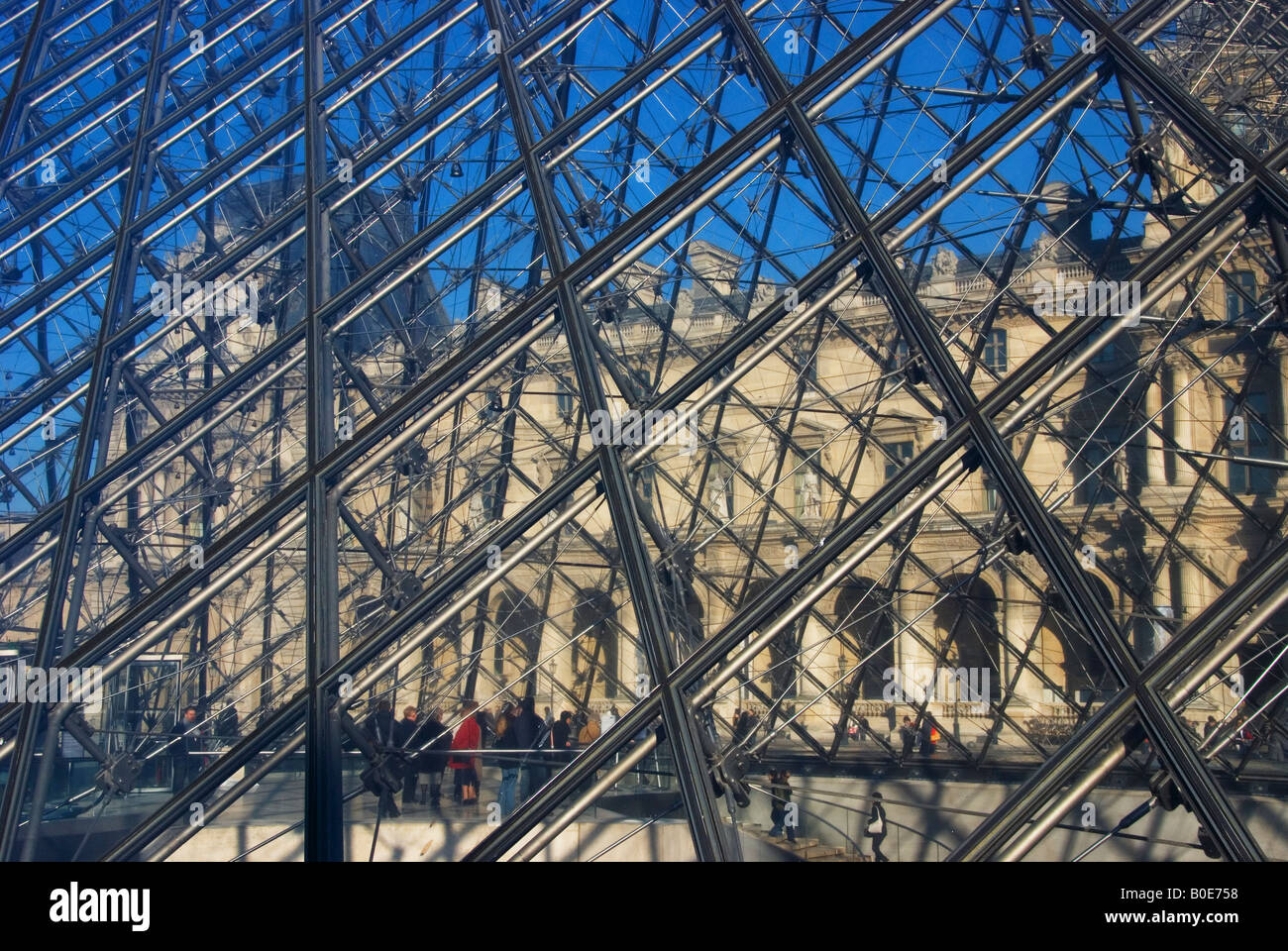 Architectural detail of the glass pyramid of the Louvre Stock Photo - Alamy