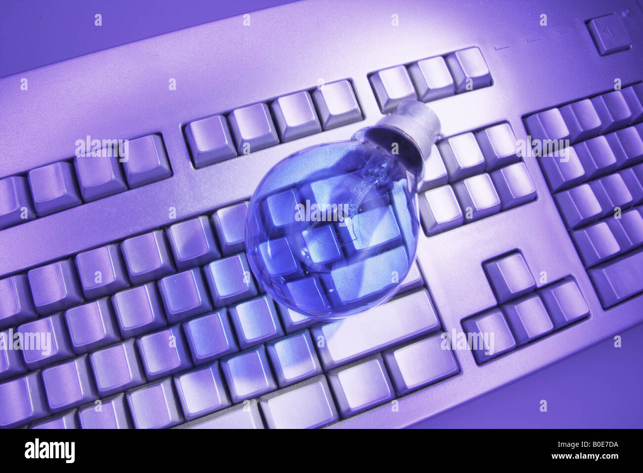 Light Bulb on Computer Keyboard Stock Photo - Alamy