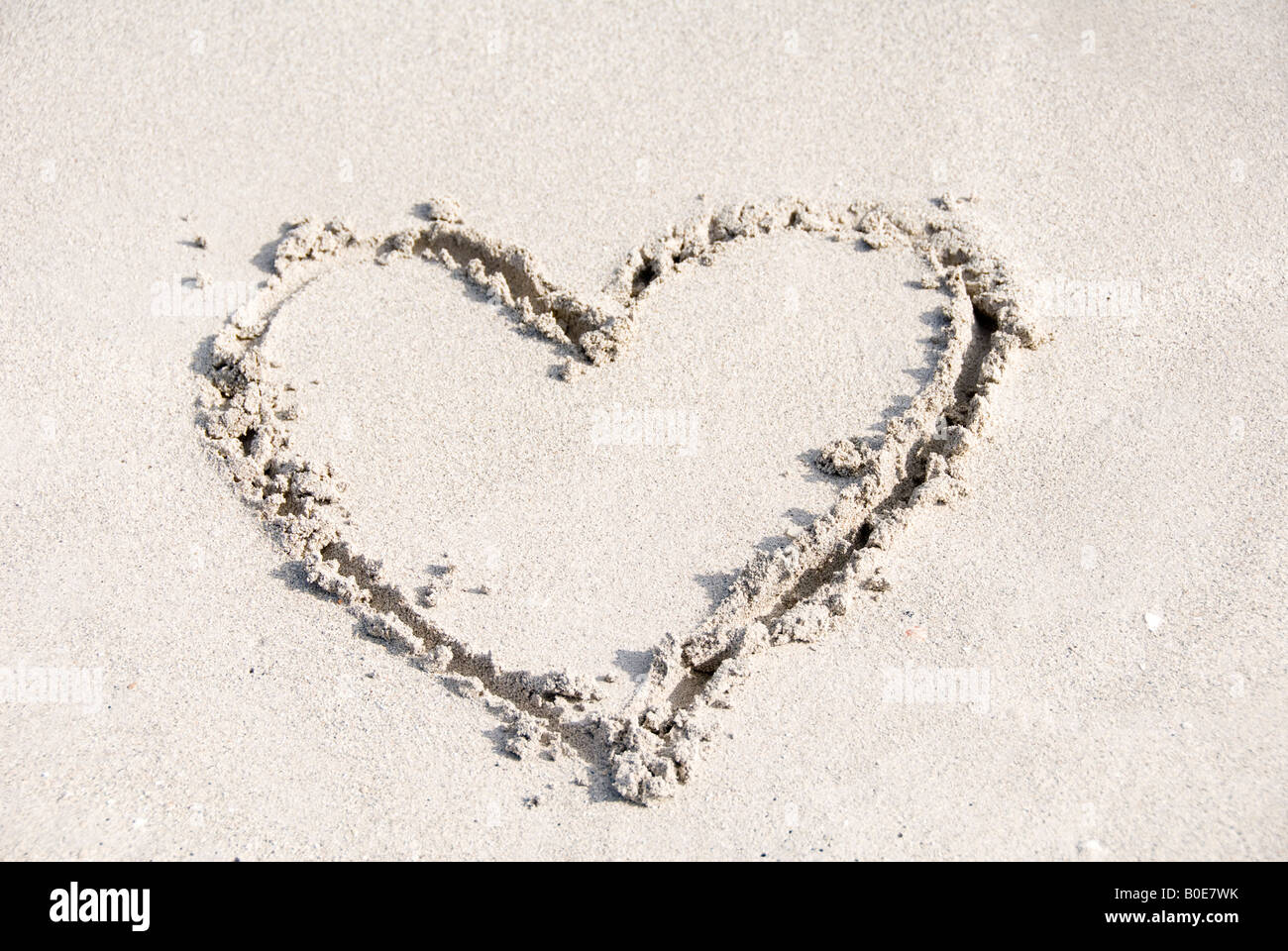 heart on sand Stock Photo - Alamy