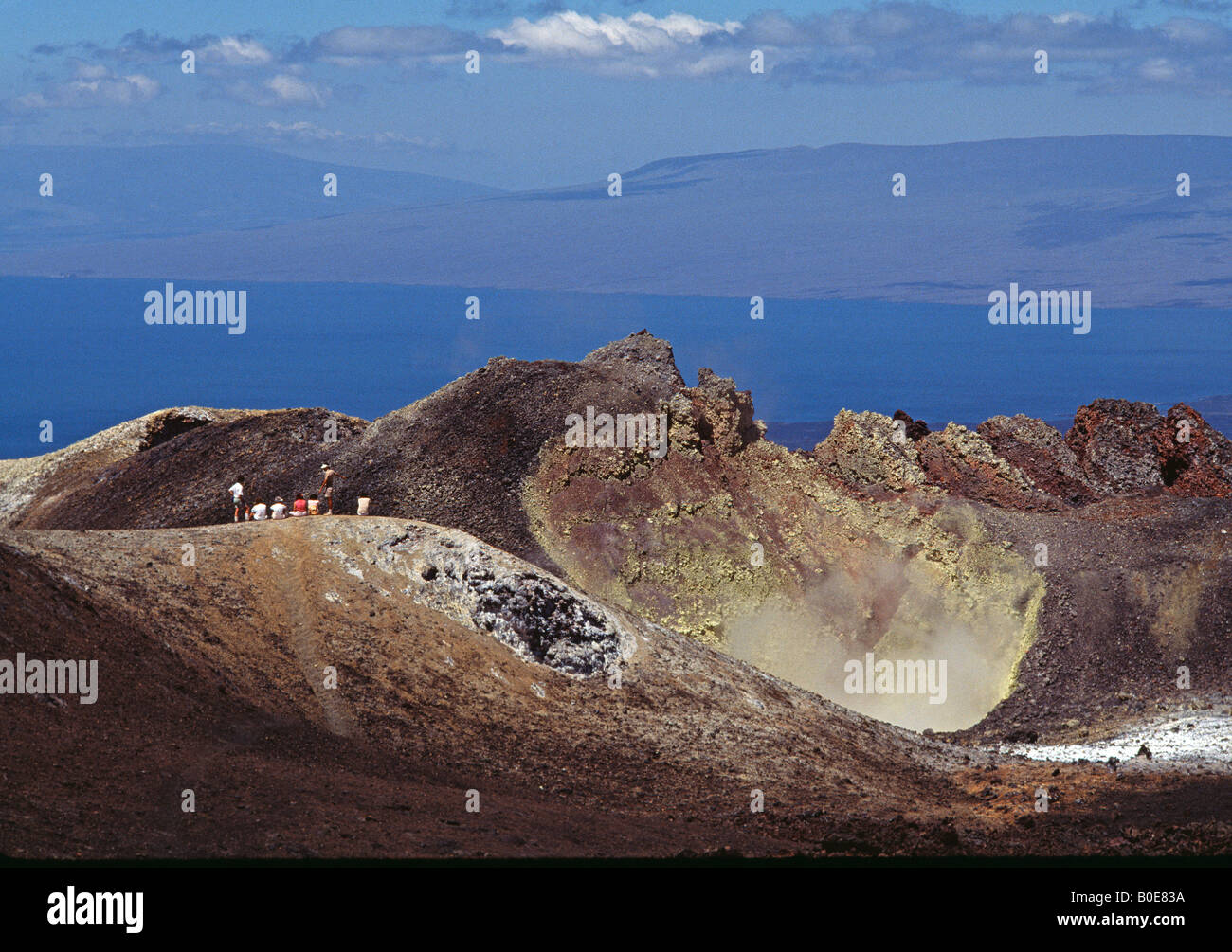 Hikers at fumarole, Sierra Negra Volcano, Isabela Island, Galapagos ...